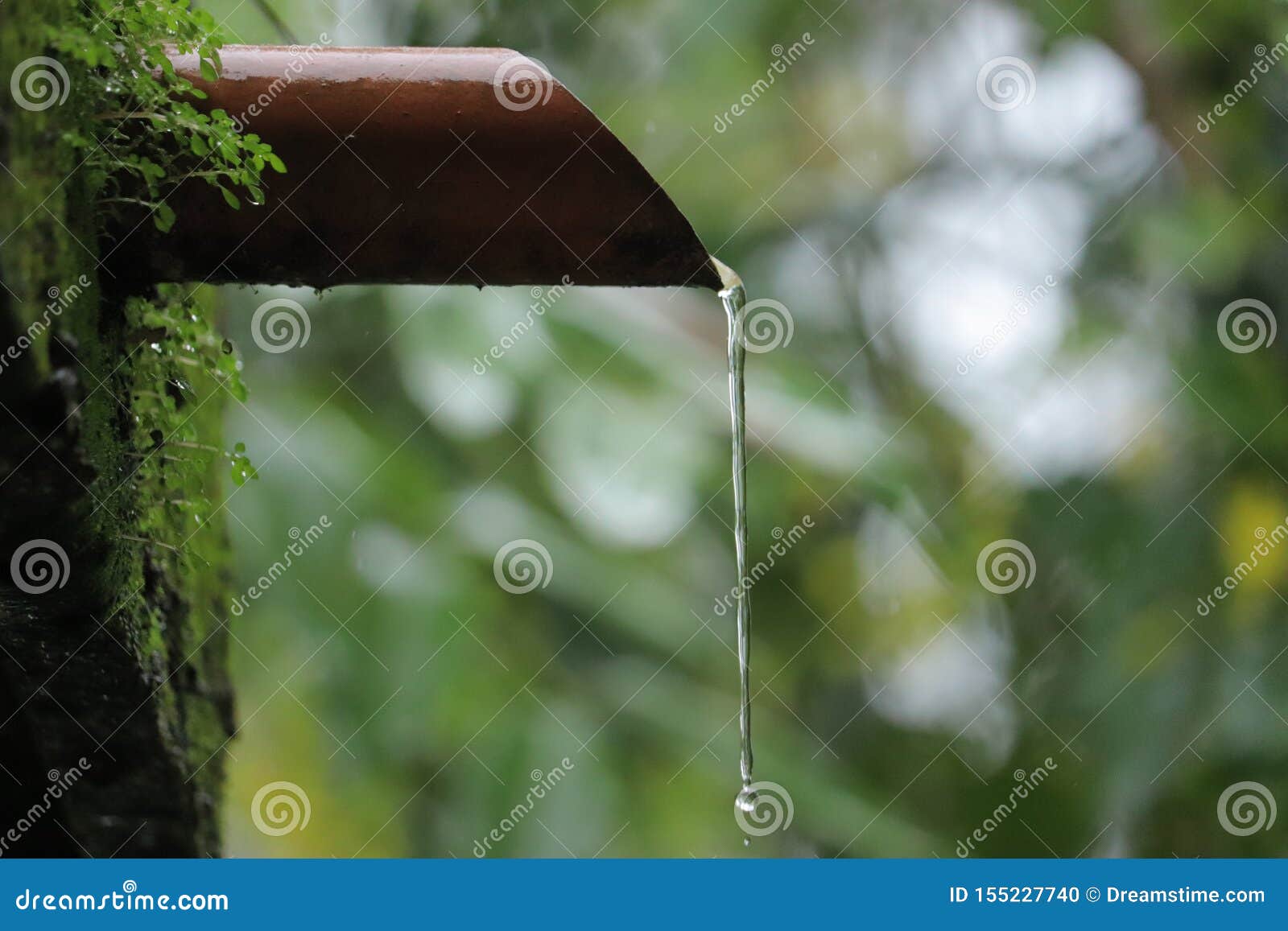 Water Dropping from Orange Pipe Stock Photo - Image of losing, deluge ...