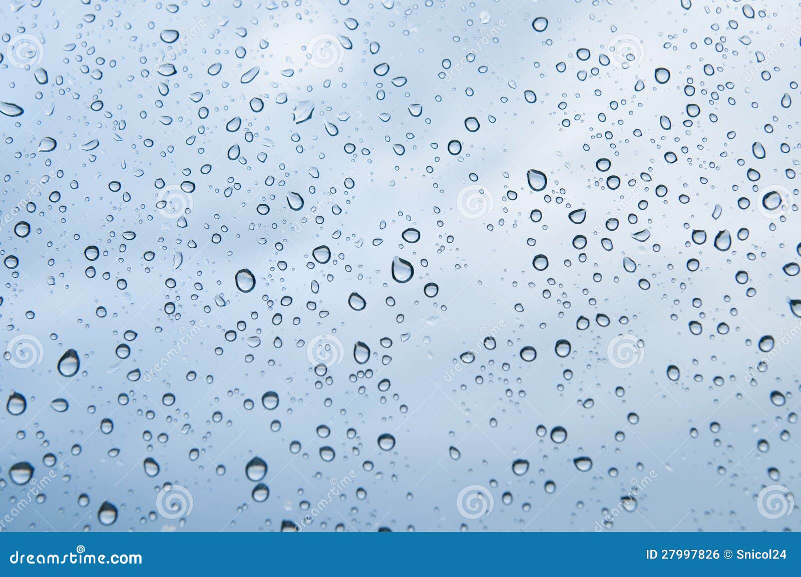 Rain water drops on blue stock photo. Image of heavily - 27997826