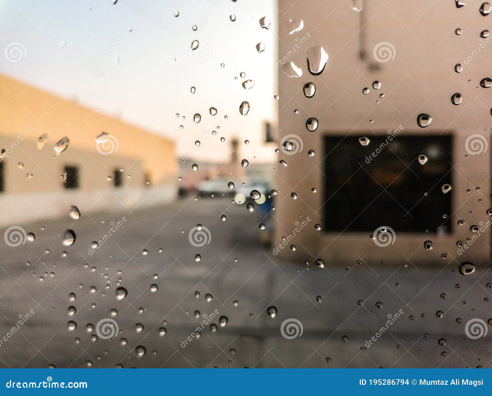 Rain Water Drops on the Screen in a Bright and Beautiful Day Stock ...