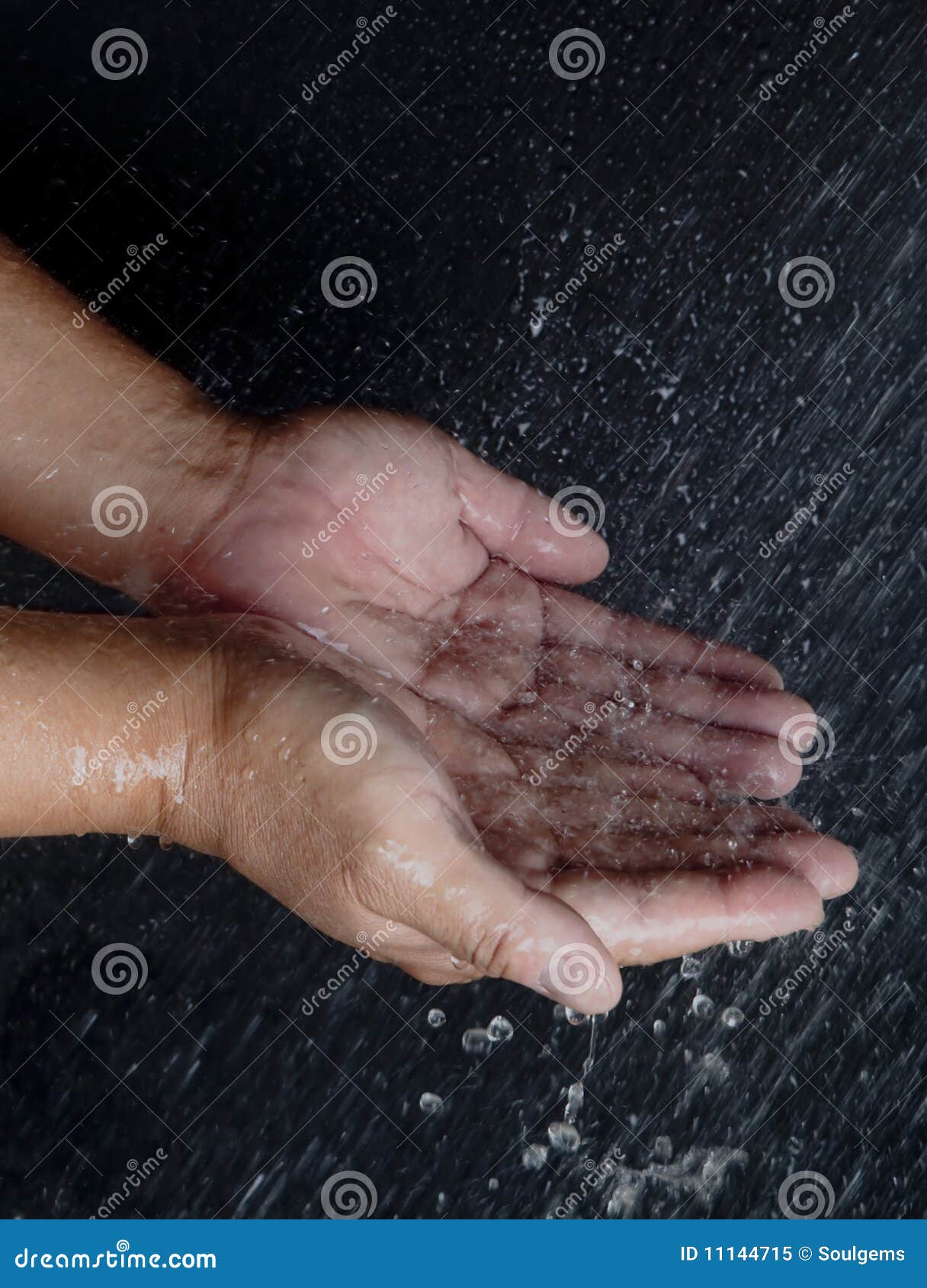 Rain Falling On A Hand