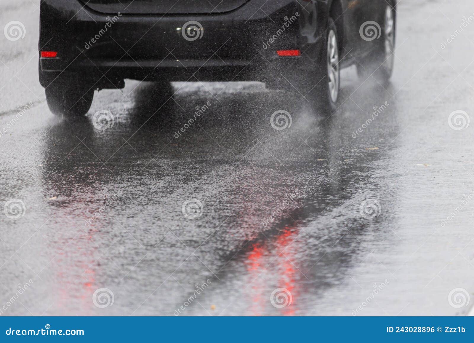 Rain Water Splash Flow from Wheels of Black Car Moving Fast in Daylight ...