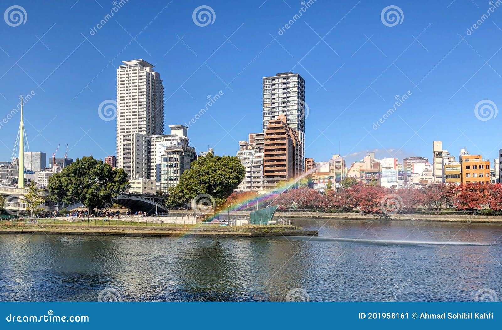 Rainbow above the river editorial photo. Image of tower - 201958161