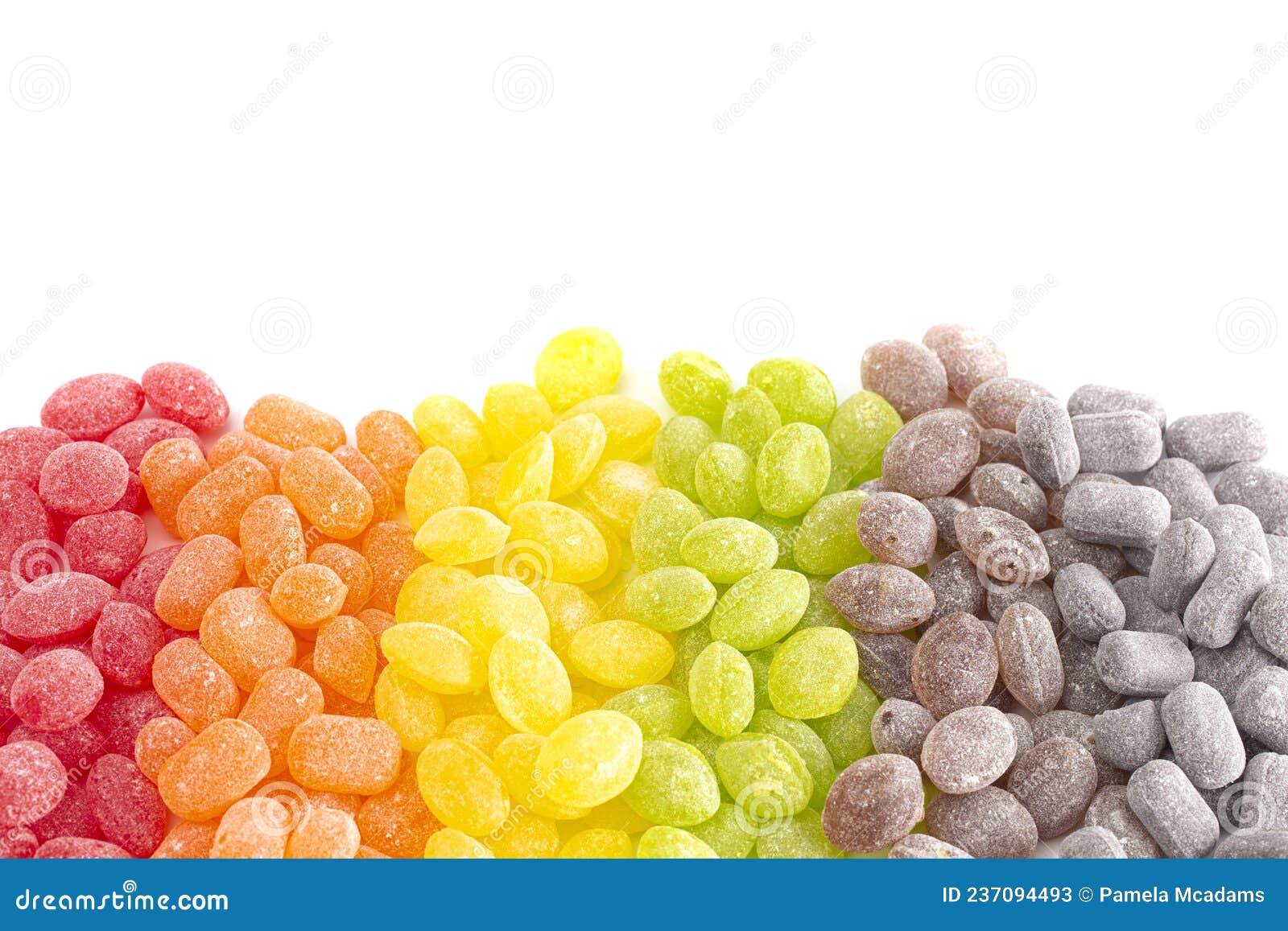 A Rainbow Assortment of Old Fashioned Hard Candies Isolated on a White ...