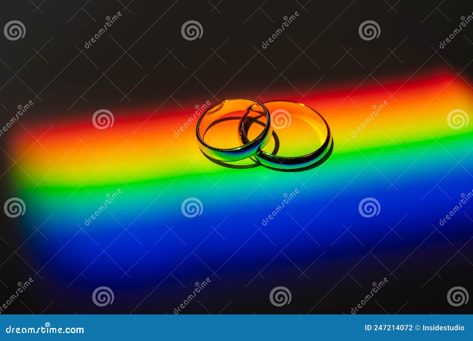 Rainbow Beam on Wedding Rings. Lgbt Flag. Stock Photo - Image of macro ...