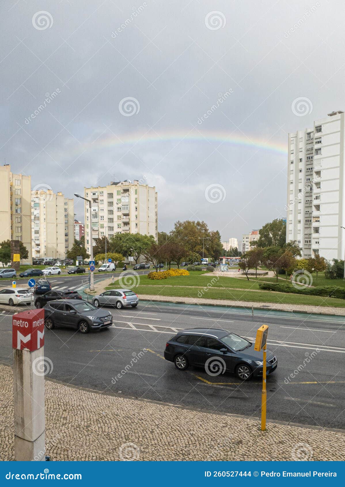 Rainbow between Buildings in the Urbanized Area in Olivais Lisbon ...