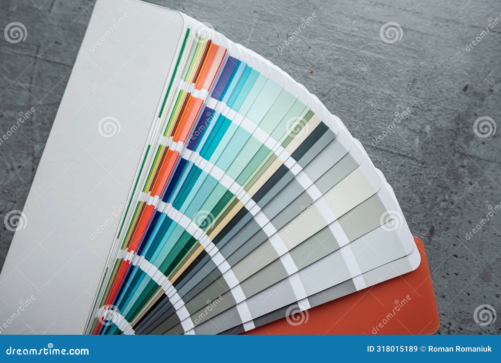 Rainbow Catalog of Paints with a Various Color Palette on Grey Desk ...