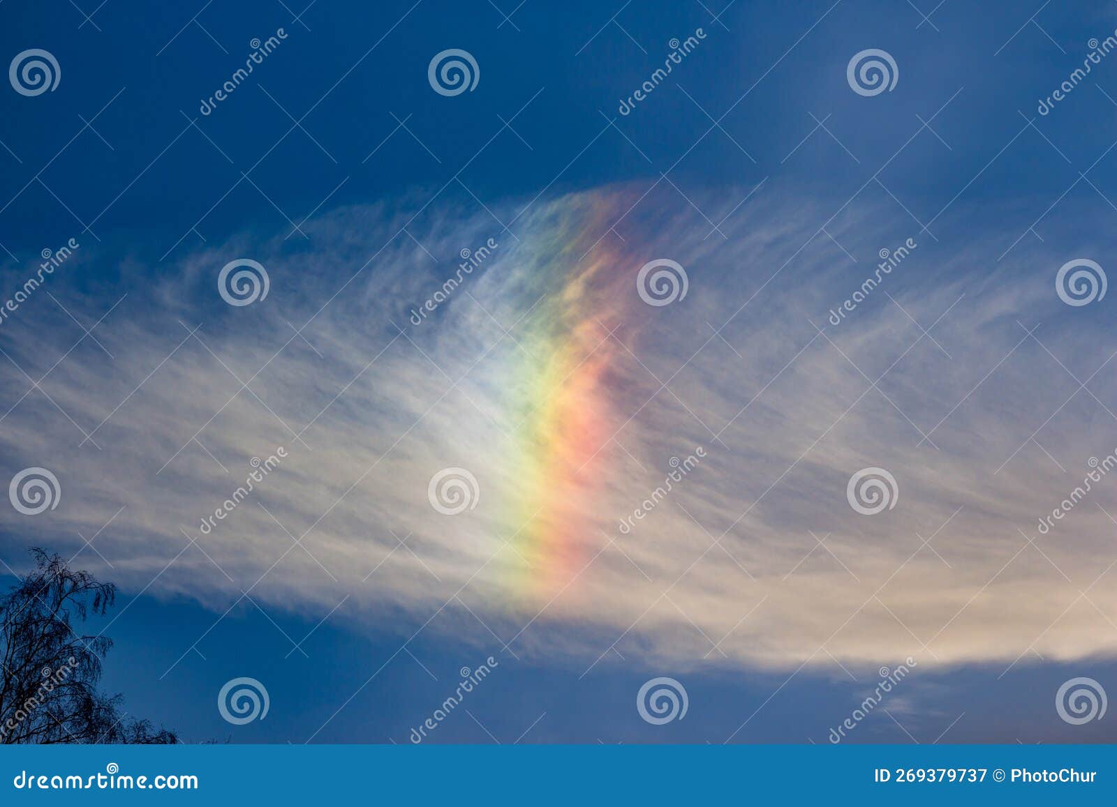 A Rainbow Cloud Against a Blue Sky, a Rare Optical Phenomenon in the ...
