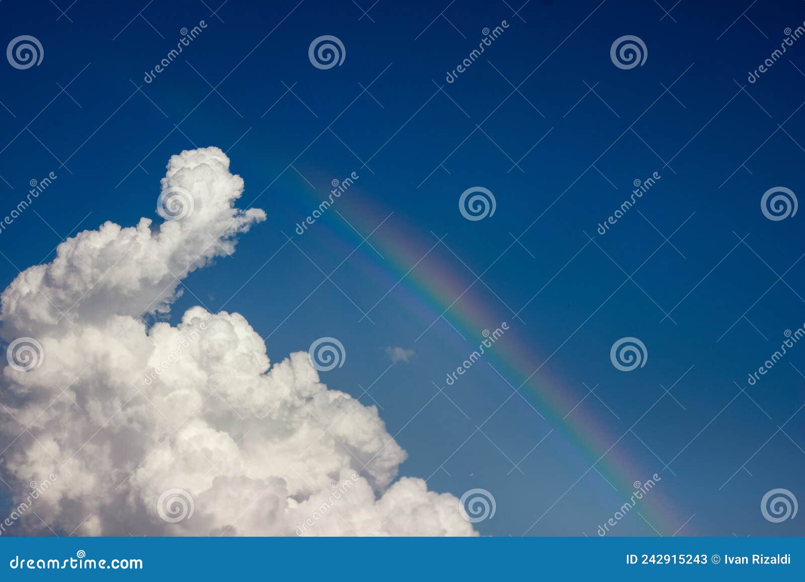 Rainbow with clouds stock image. Image of rainbow, storm - 242915243