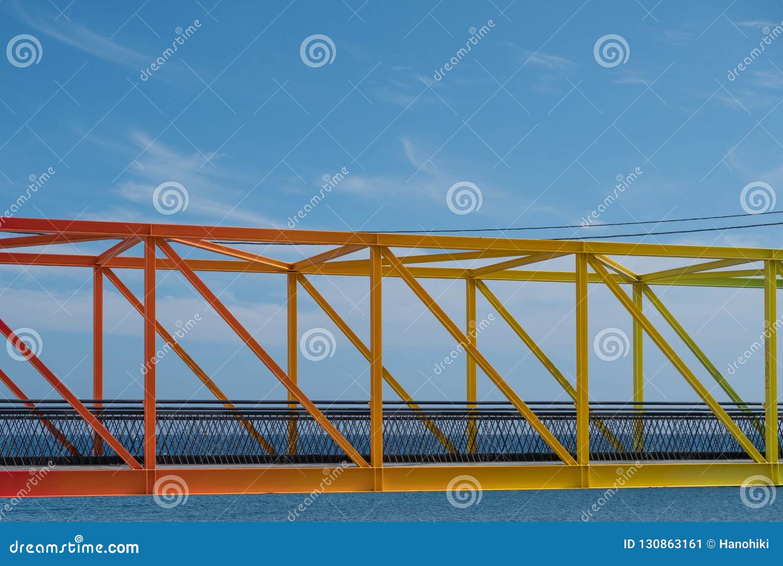 Rainbow Colored Bridge with Ocean Background - Colorful Steel Br Stock ...