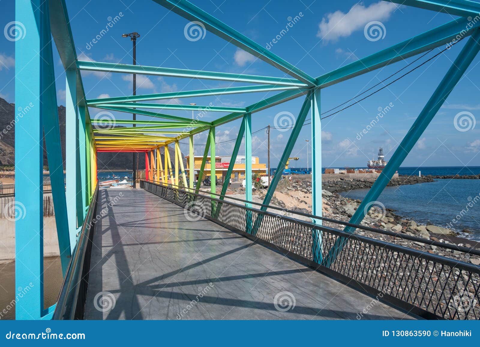 Rainbow Colored Bridge with Ocean Background - Colorful Steel Br Stock ...