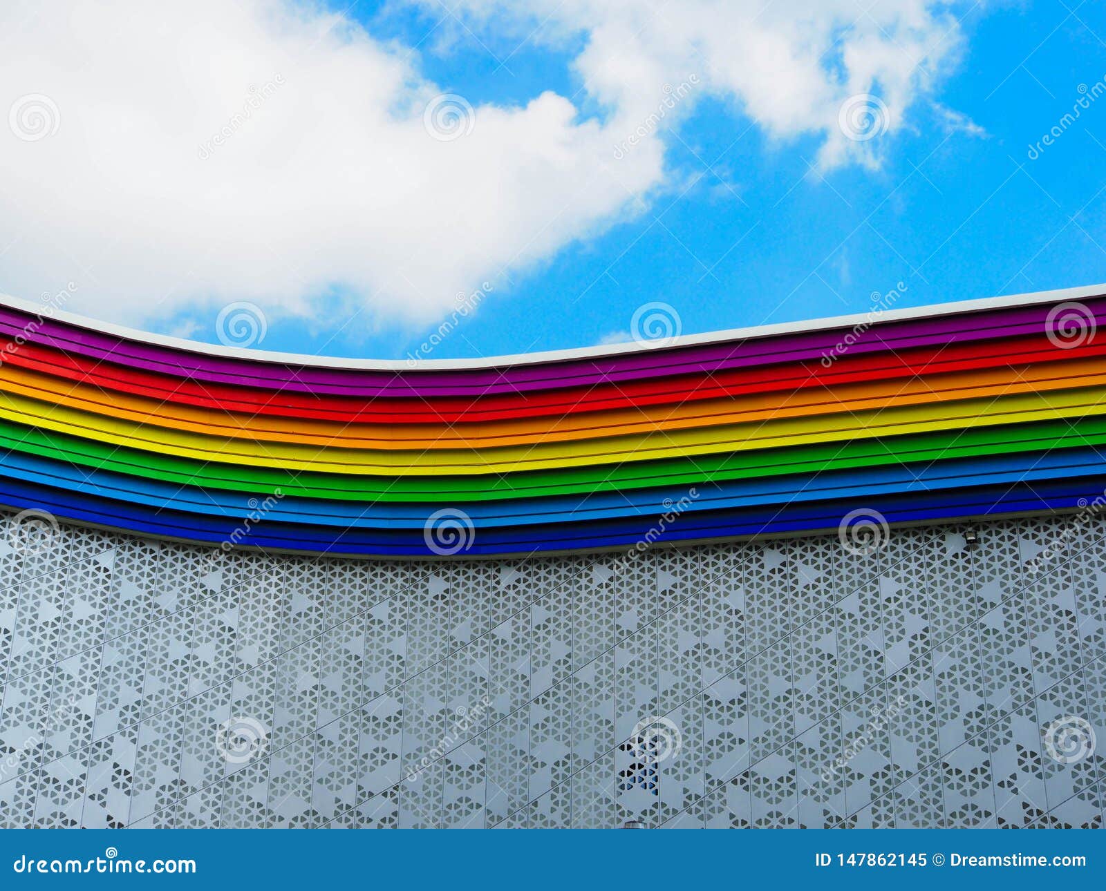 Rainbow colored building stock image. Image of cloud - 147862145