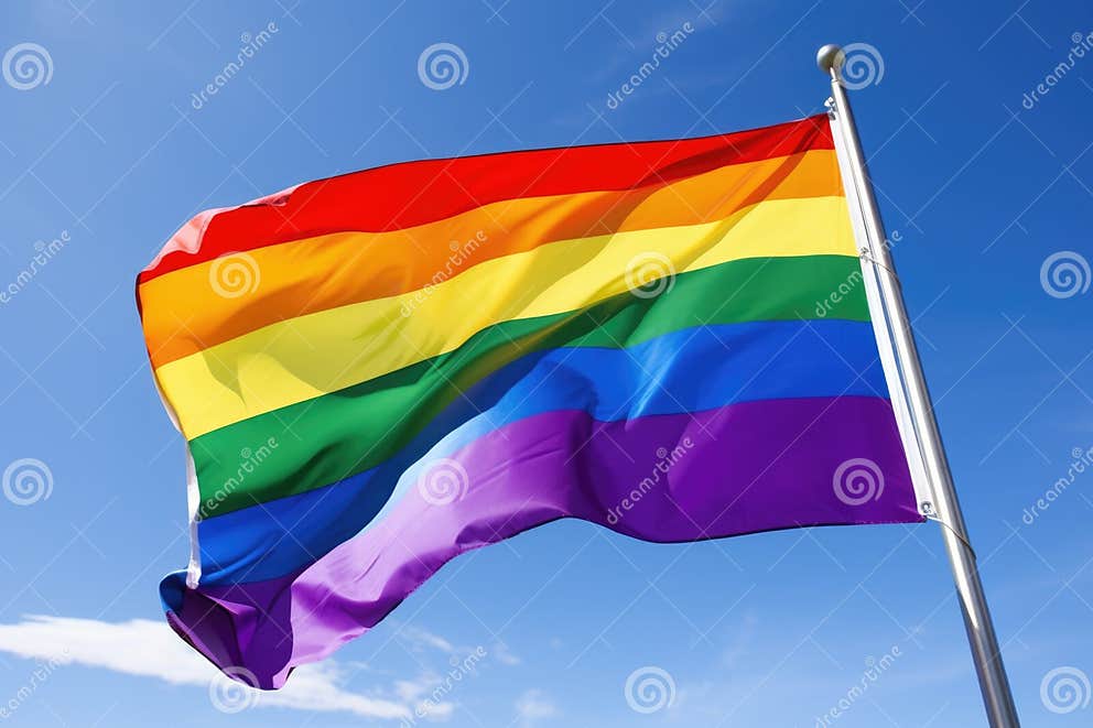 A Rainbow Colored Flag Fluttering in the Wind Stock Photo - Image of ...