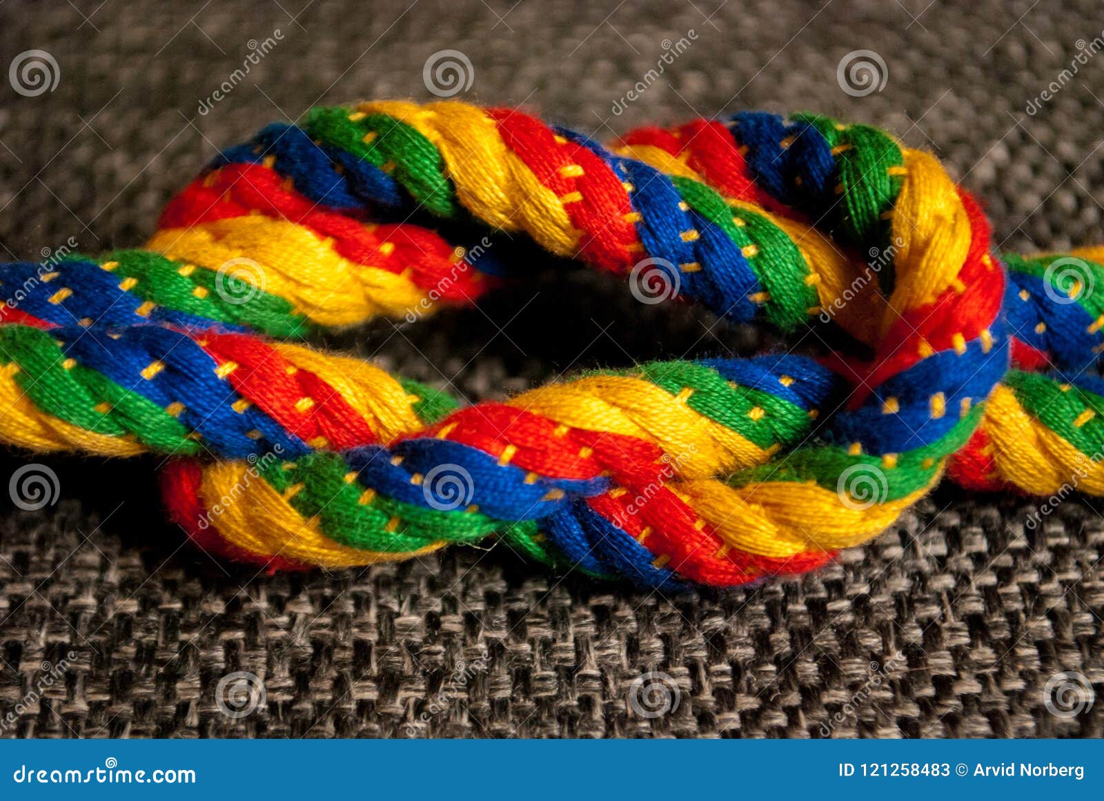 A rainbow colored knot stock image. Image of braided - 121258483