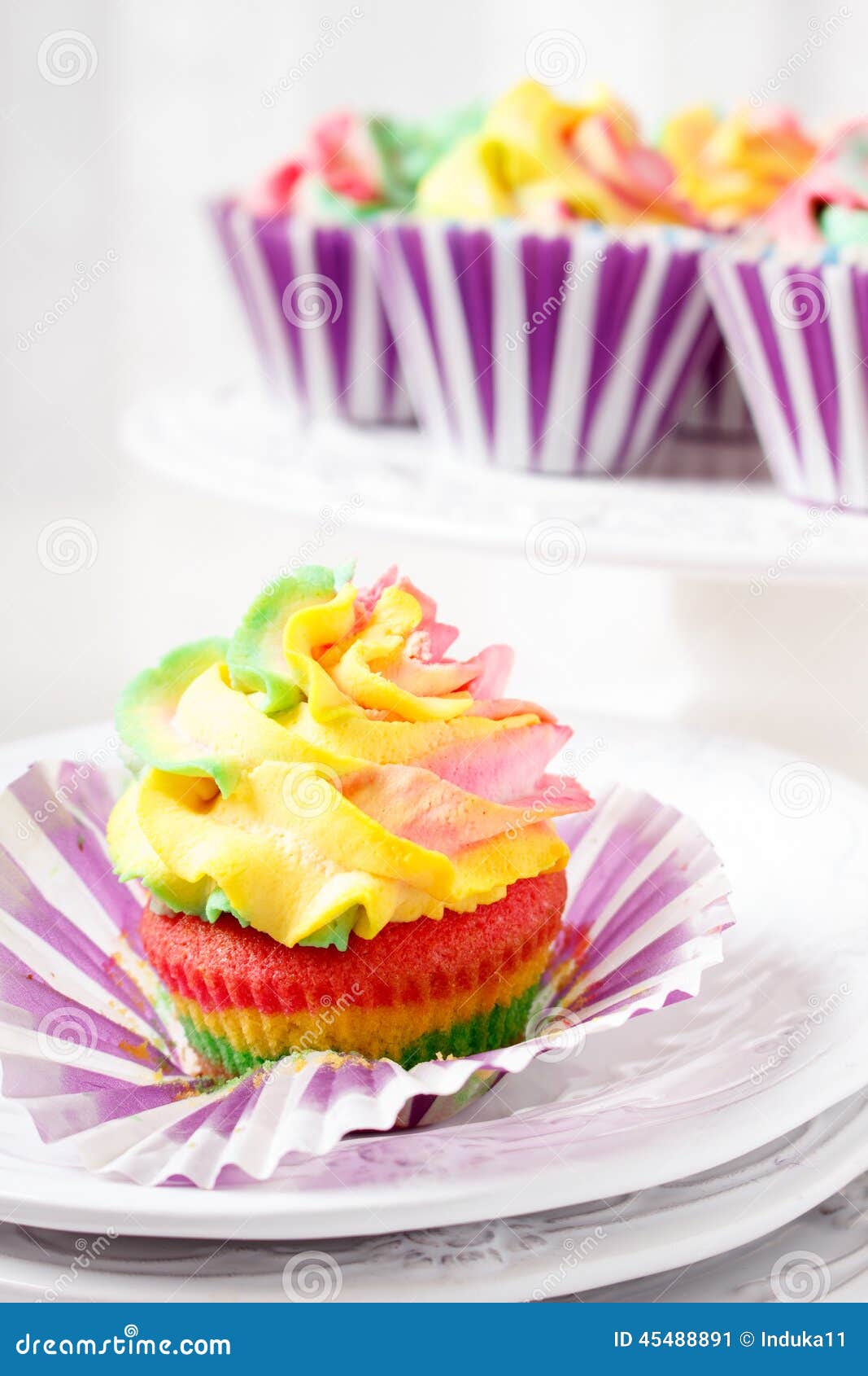 Rainbow colored muffins stock image. Image of bakery - 45488891