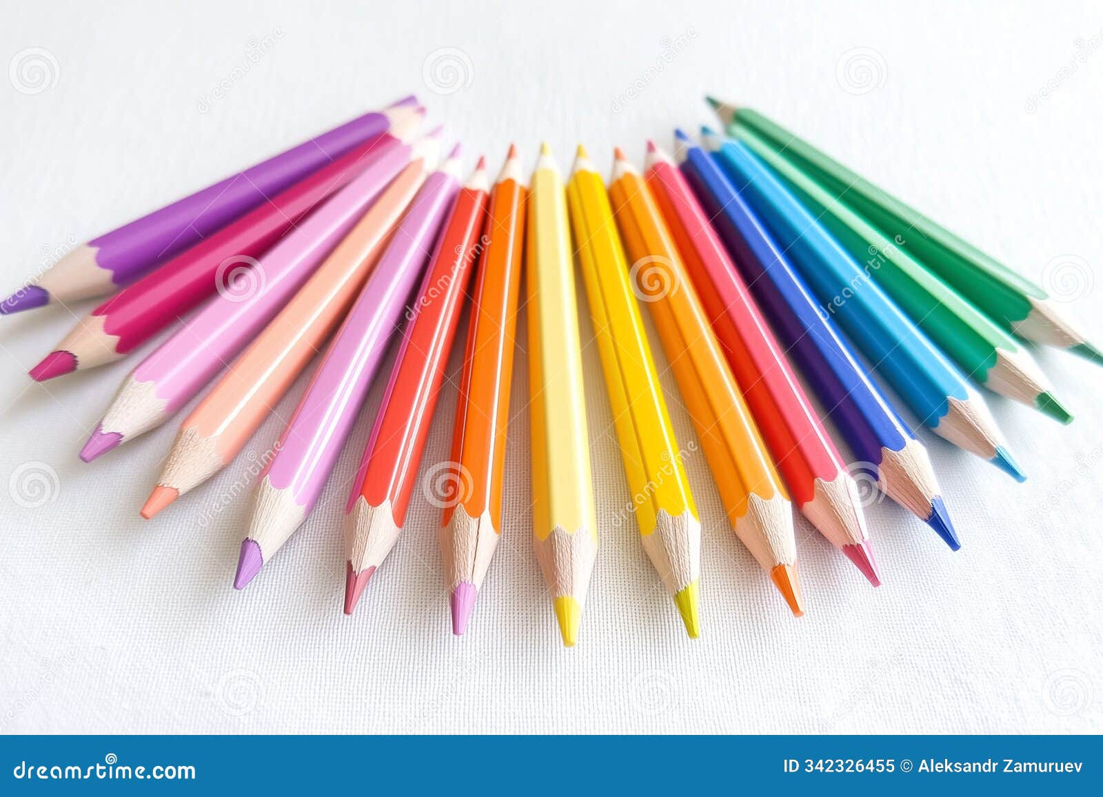 Rainbow-colored Pencils Form a Striking Circular Display on a White ...