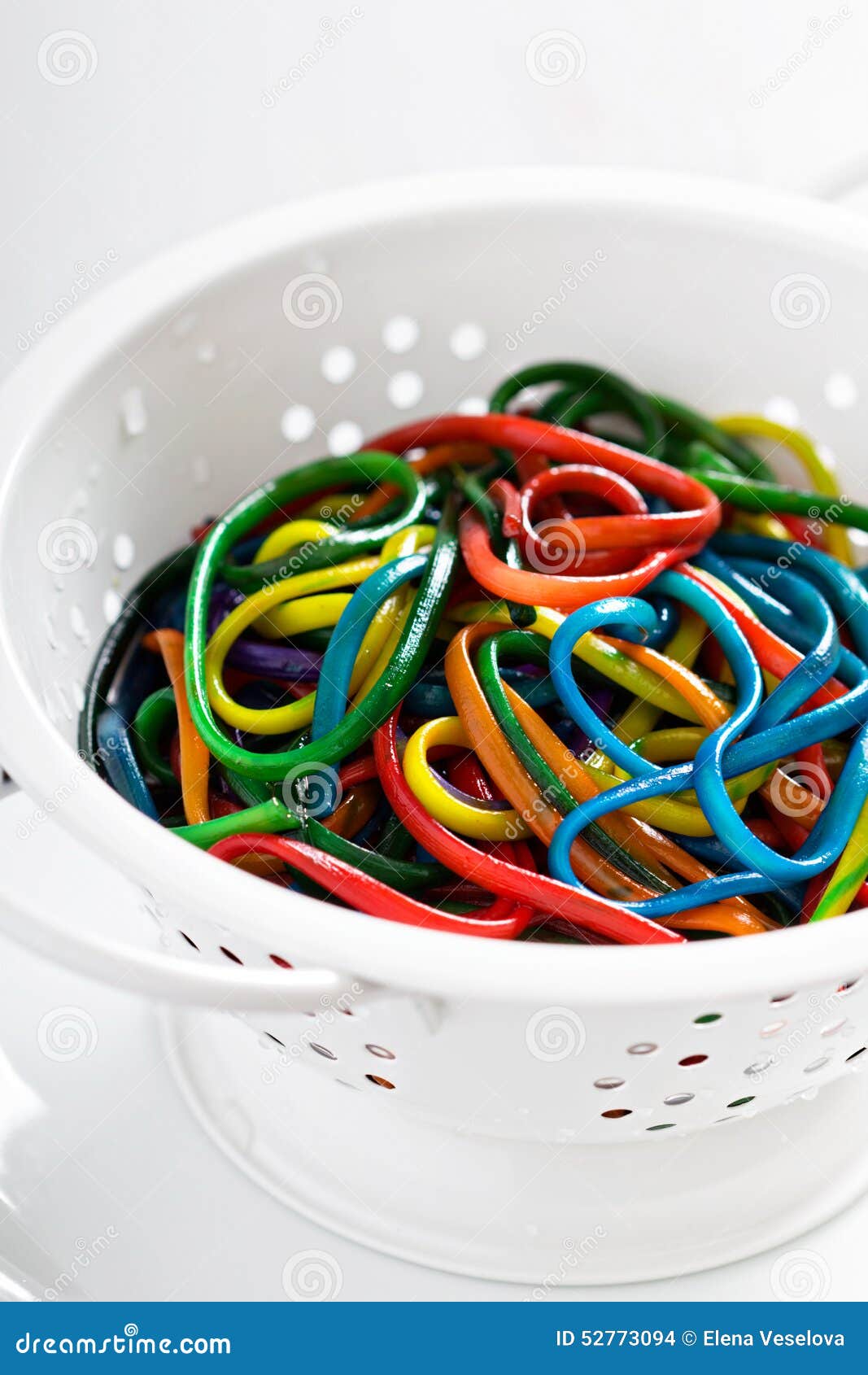 Rainbow Colored Spaghetti in a Colander Stock Photo - Image of ...