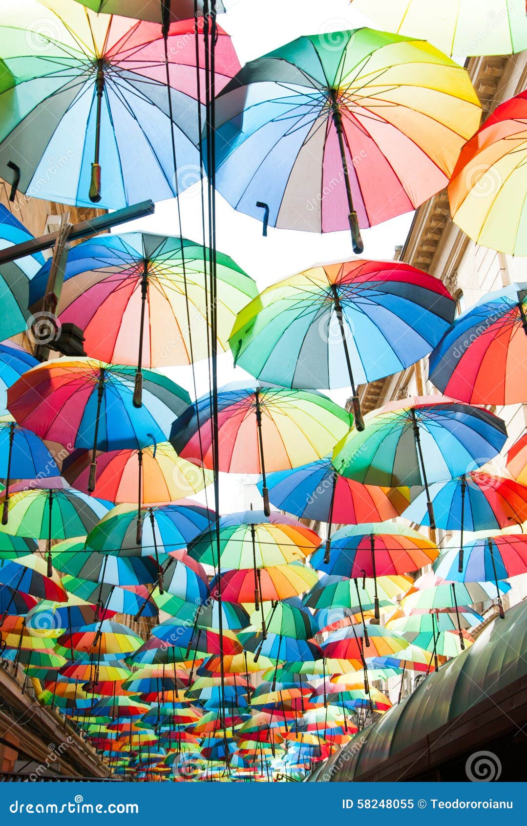 Rainbow colored umbrellas stock image. Image of roofing - 58248055