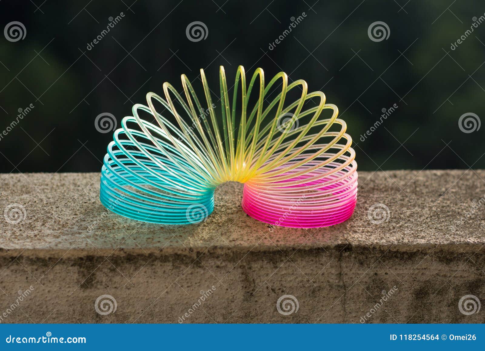 Rainbow Colored Wire Spiral Toy. Editorial Stock Image - Image of curve ...