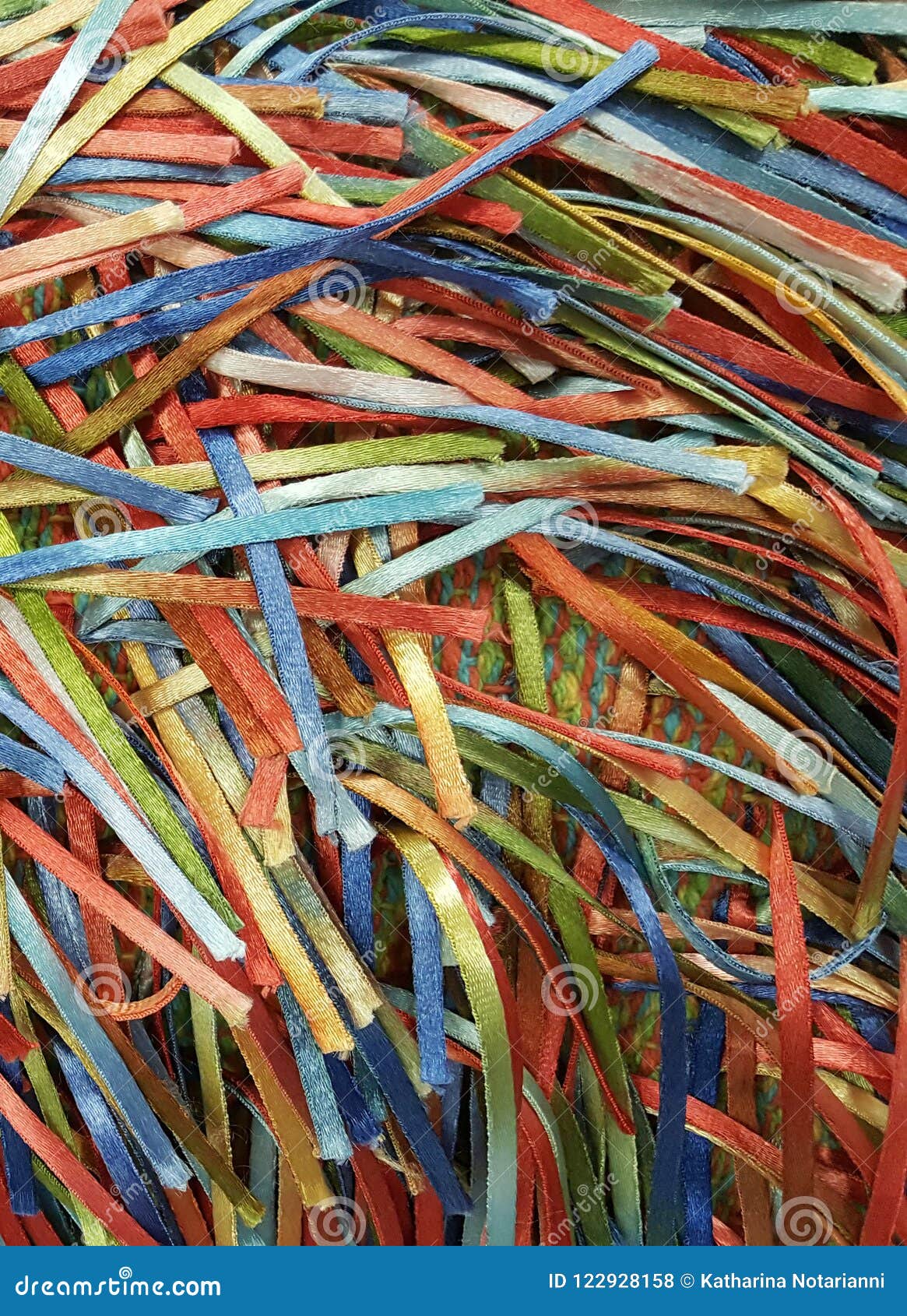 A Rainbow of Colorful Strands of Ribbons and Threads Stock Photo ...