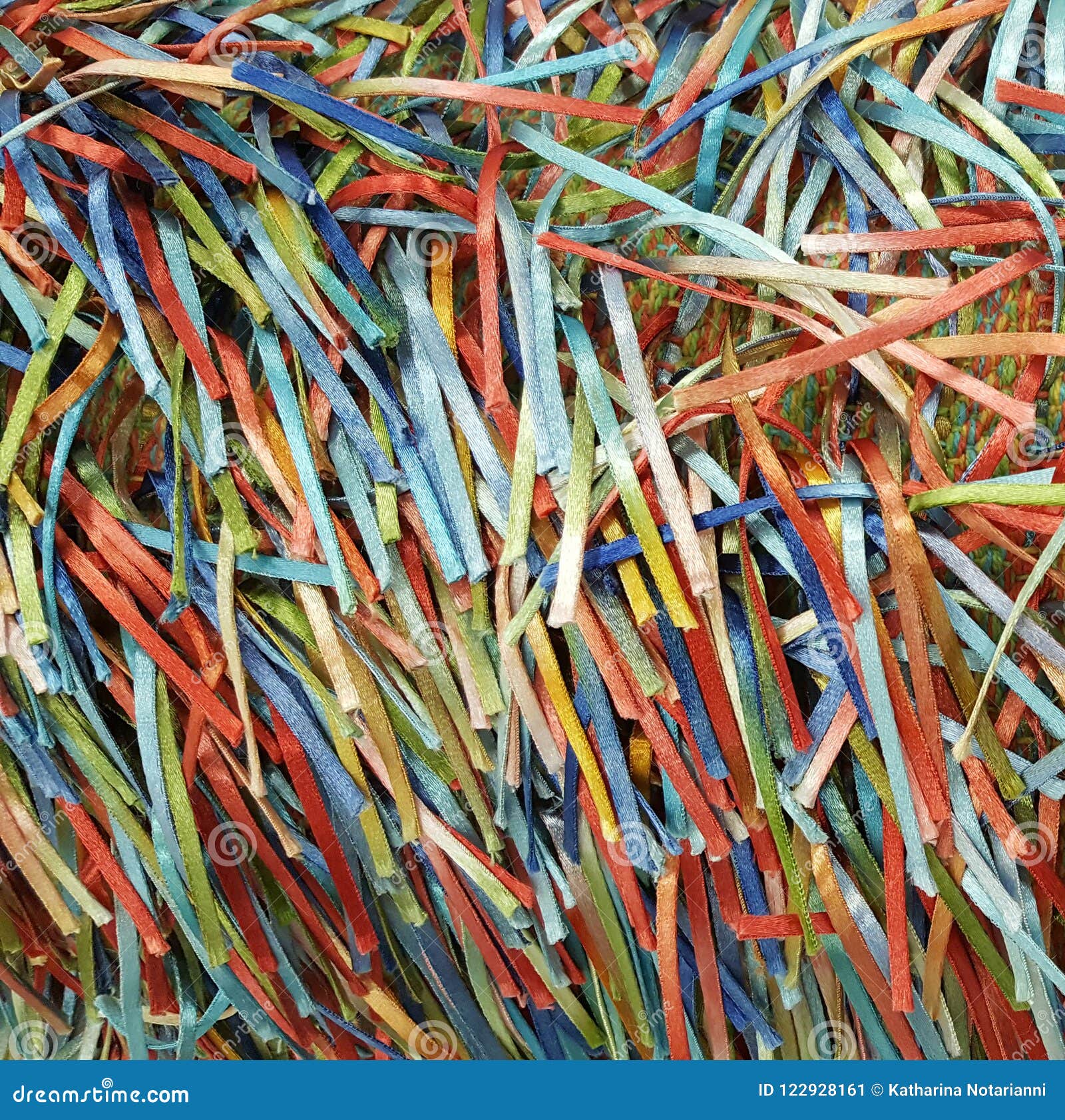 A Rainbow of Colorful Strands of Ribbons and Threads Stock Image ...