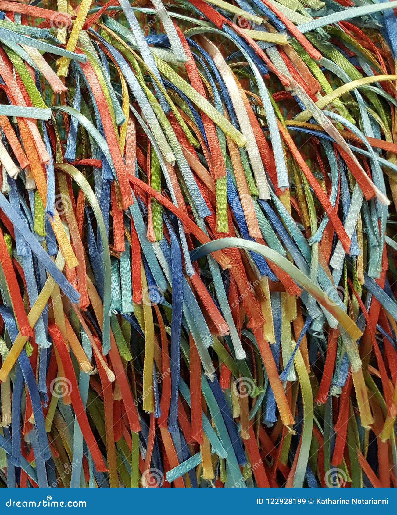 A Rainbow of Colorful Strands of Ribbons and Threads Stock Image ...