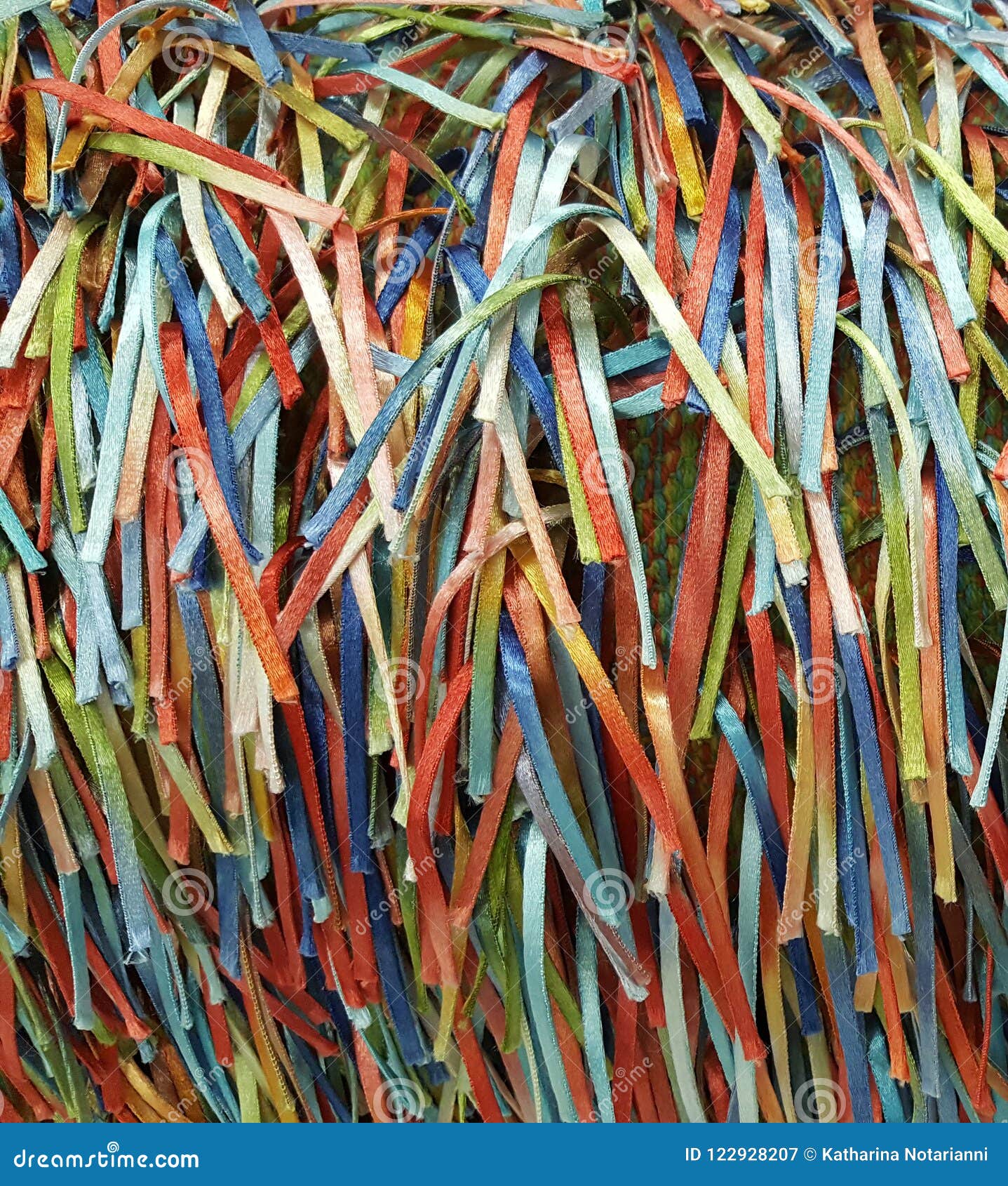 A Rainbow of Colorful Strands of Ribbons and Threads Stock Image ...