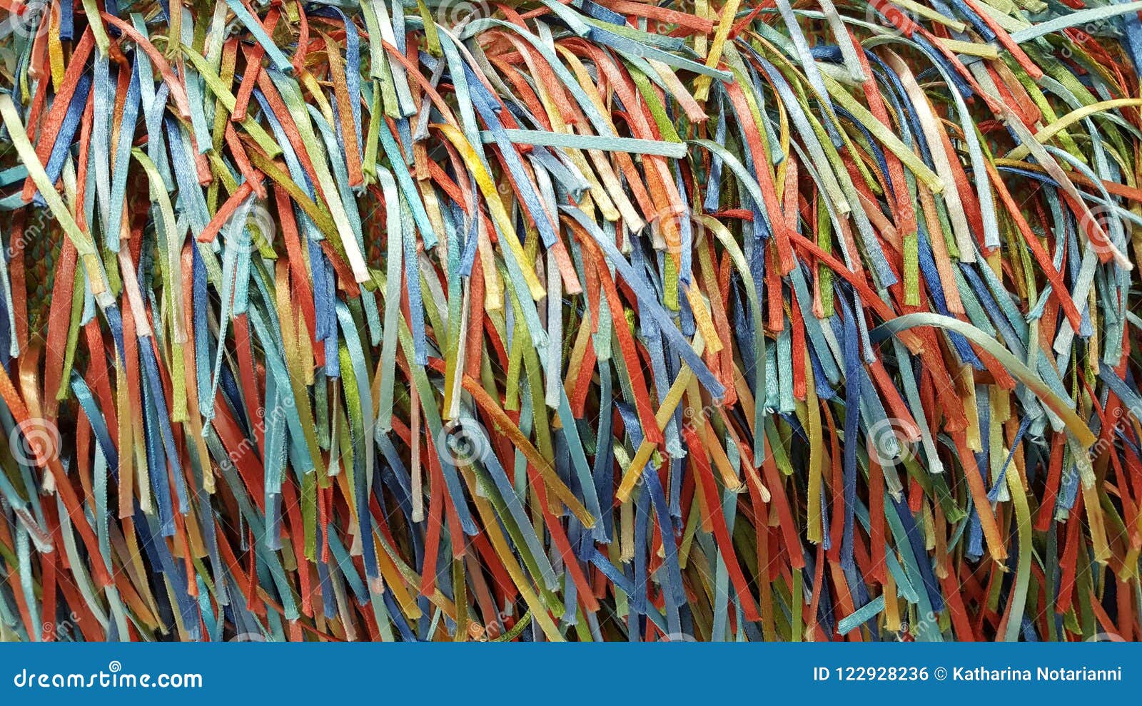 A Rainbow of Colorful Strands of Ribbons and Threads Stock Photo ...