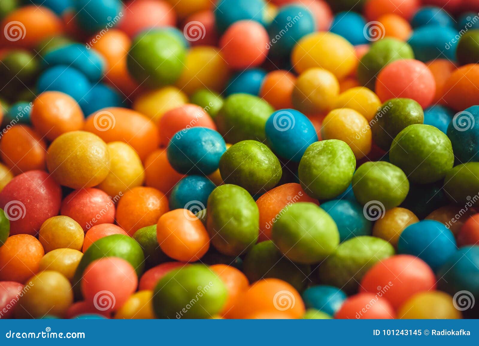 Rainbow Colors on Background of Bright Candy Small Round Forms ...