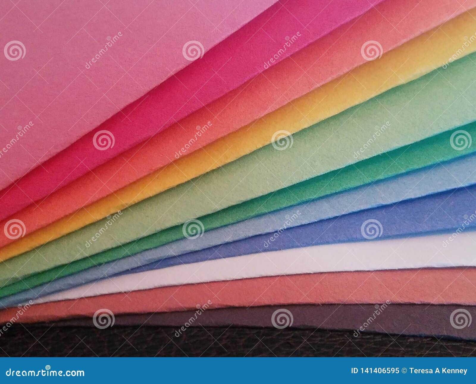 Rainbow colors of paper stock image. Image of fanned - 141406595