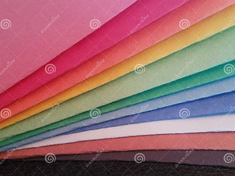 Rainbow colors of paper stock image. Image of fanned - 141406595