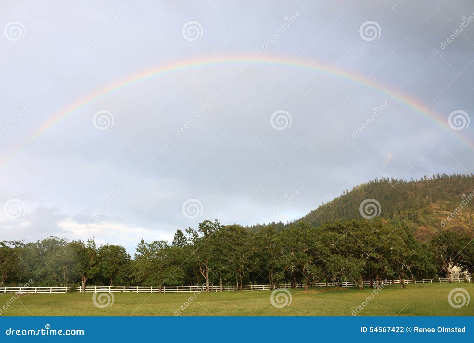 Rainbow in the Country after Springtime Rainshower Stock Photo - Image ...