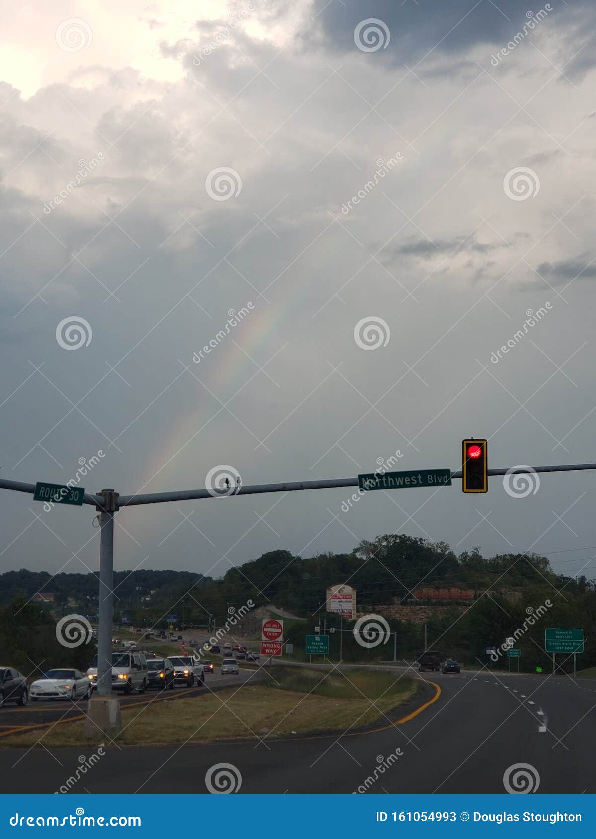 Rainbow while Driving in Traffic at a Red Stoplight Stock Image - Image ...