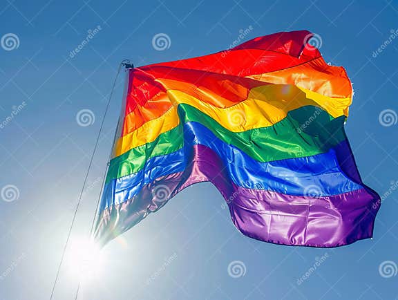 A Rainbow Flag is Flying in the Wind Stock Image - Image of string ...