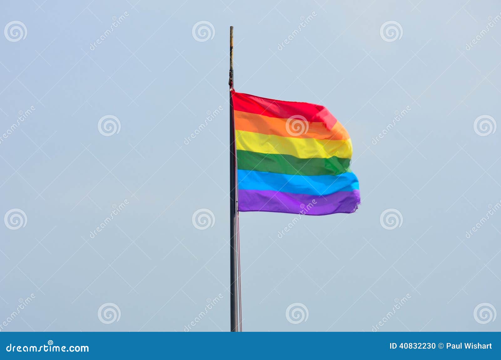 Rainbow Flag Flying in Wind Stock Photo - Image of symbol, proud: 40832230