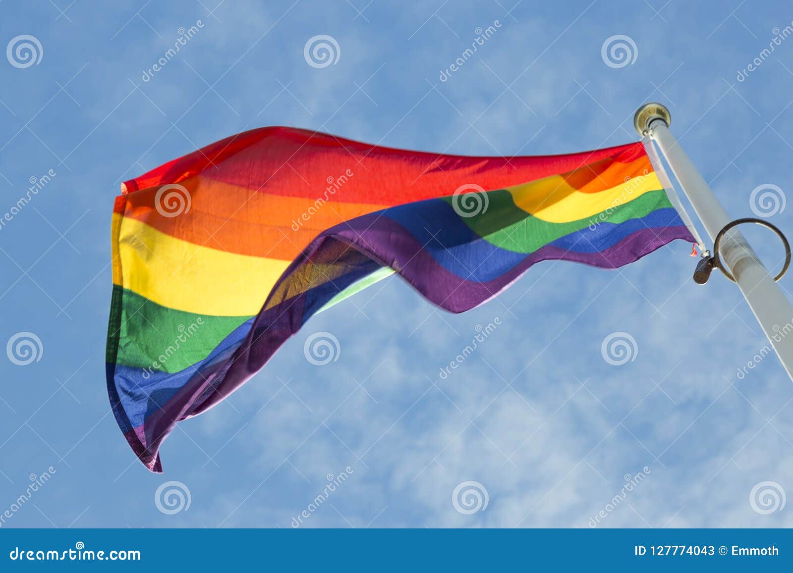 Rainbow Flag Waving in the Wind Stock Image - Image of wind, green ...