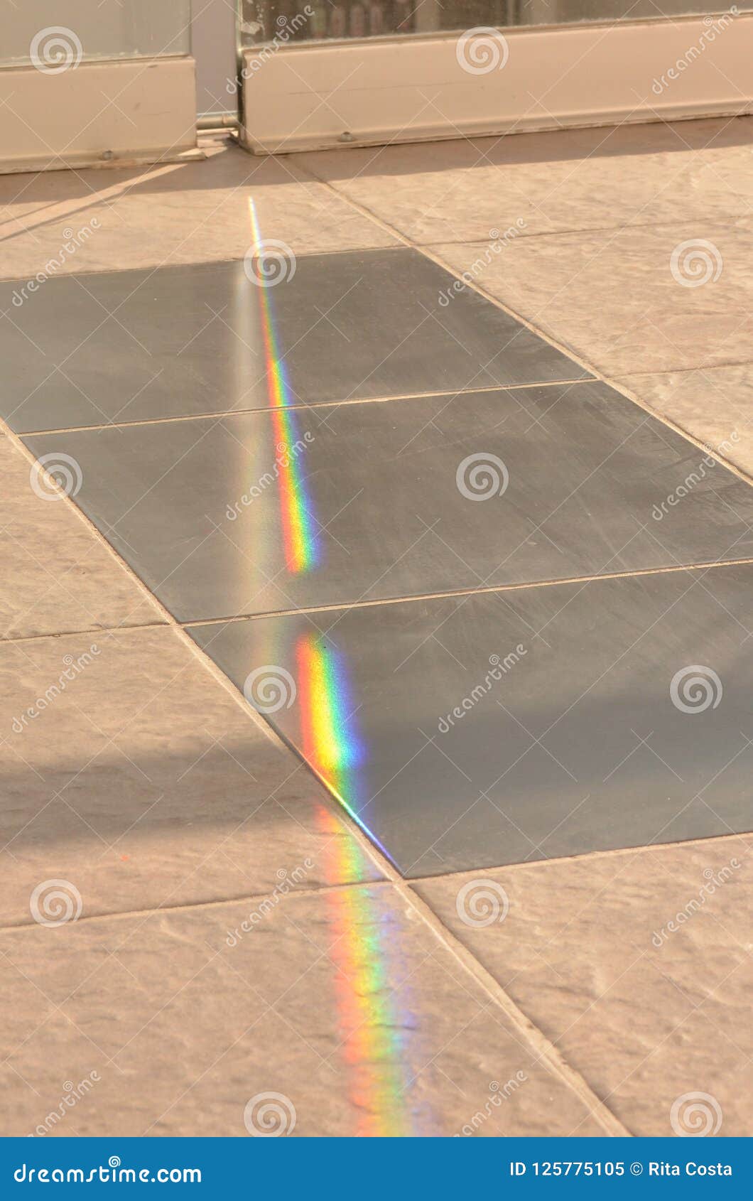 Rainbow on the floor stock image. Image of prism, glass - 125775105