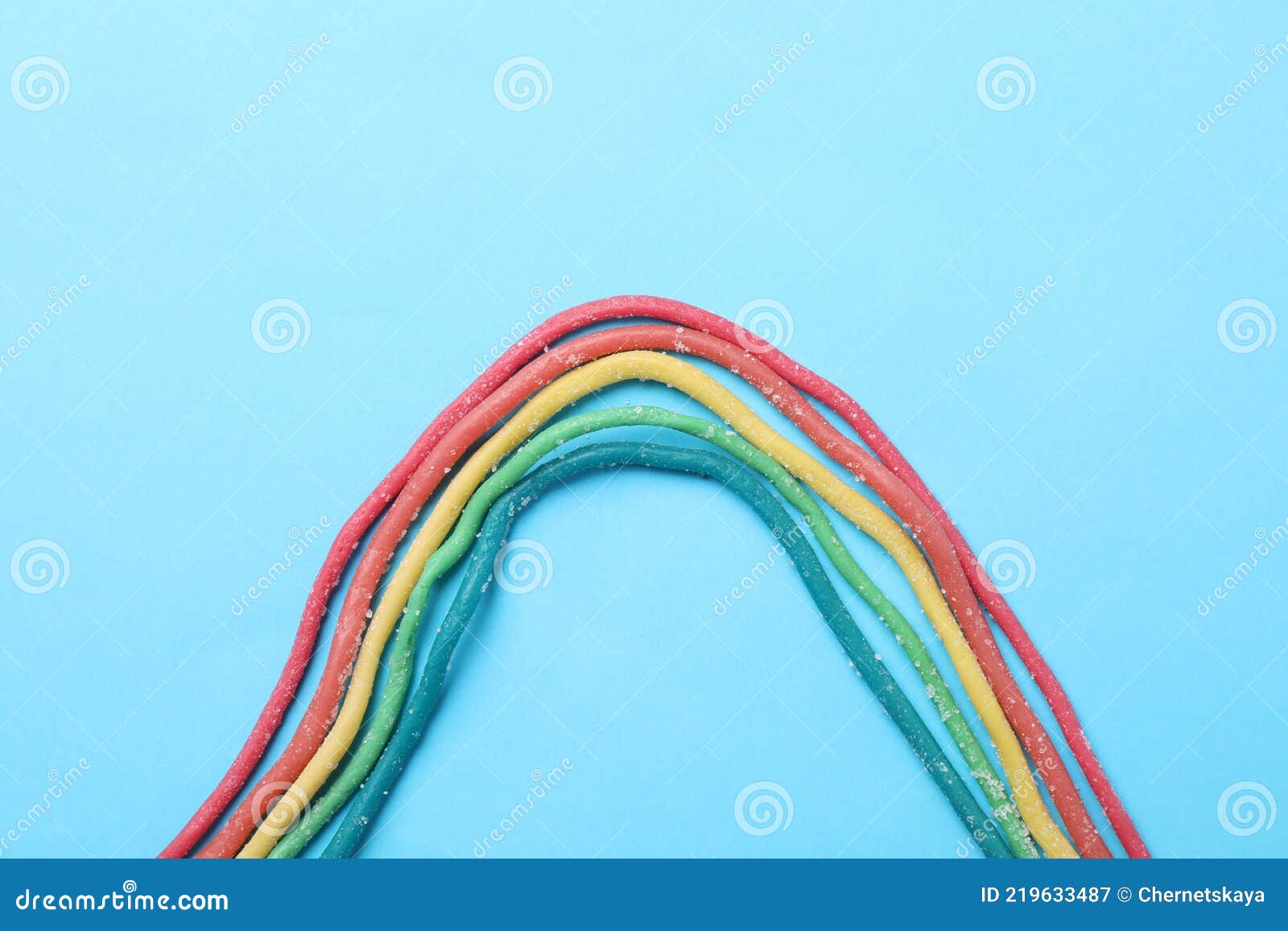 Rainbow of Gummy Strings on Light Blue Background, Flat Lay Stock Image ...