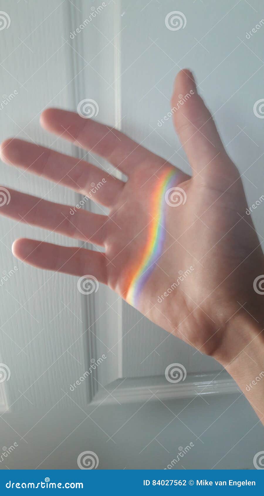 Rainbow in a hand stock photo. Image of hand, rainbow - 84027562