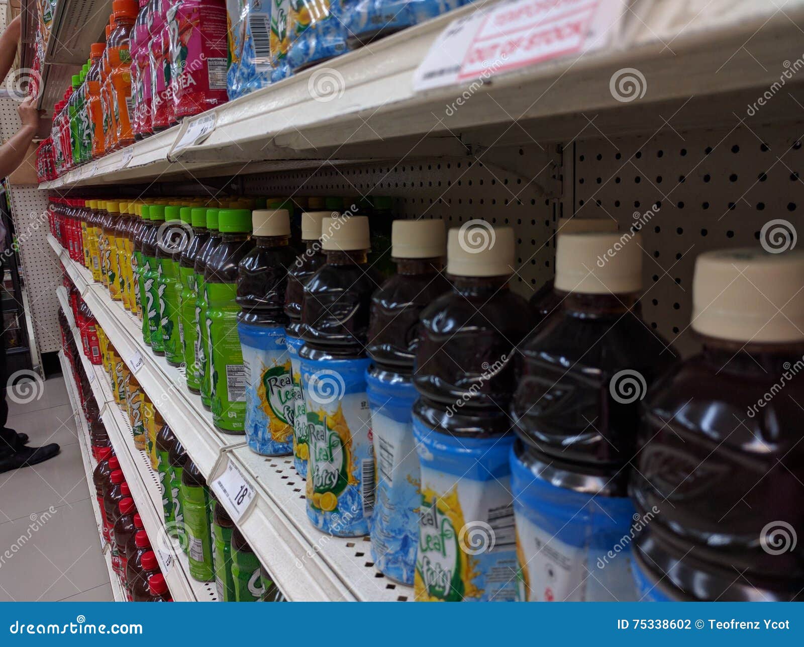 Rainbow ice tea bottles editorial photography. Image of iced - 75338602