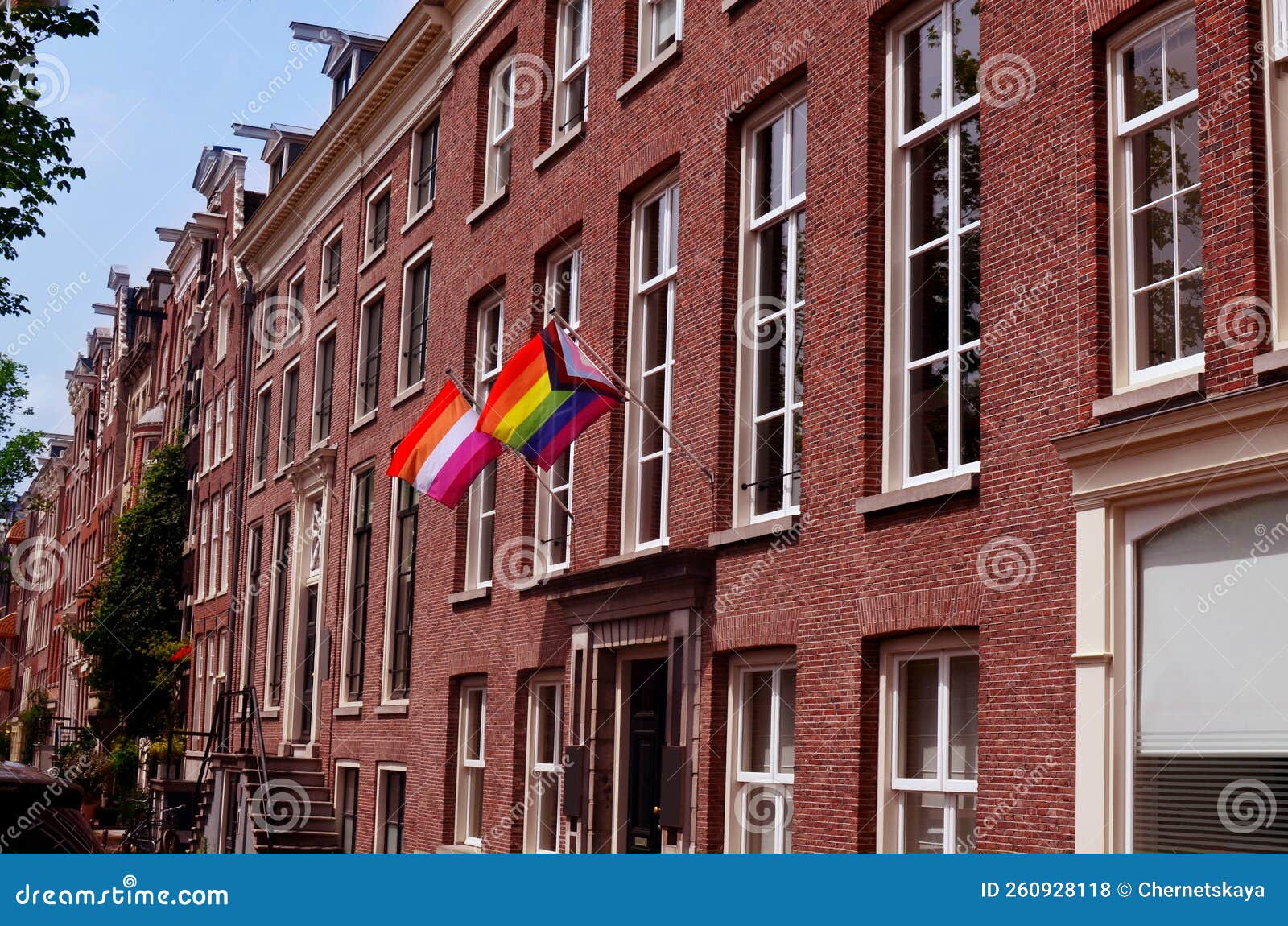 Rainbow and Lesbian Flags on Building Outdoors Stock Photo - Image of ...