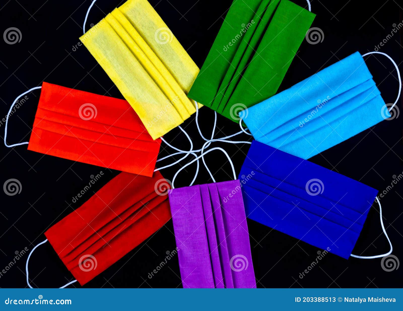 Rainbow of Medical Masks on a Black Background.Seven Multi-colored ...