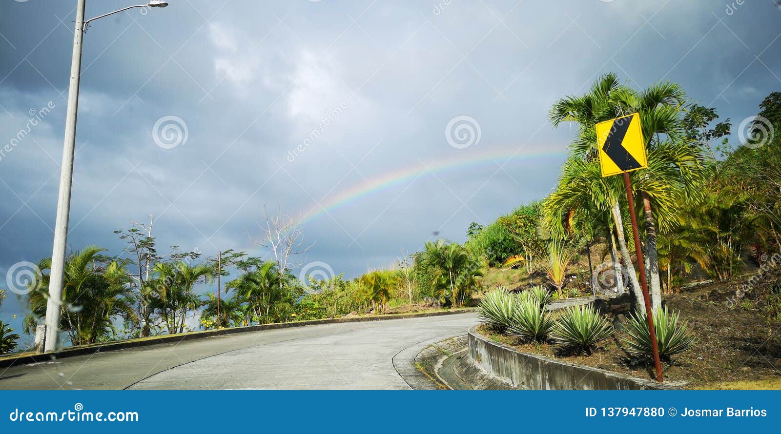 Rainbow stock photo. Image of street, sign, pole, rainbow - 137947880