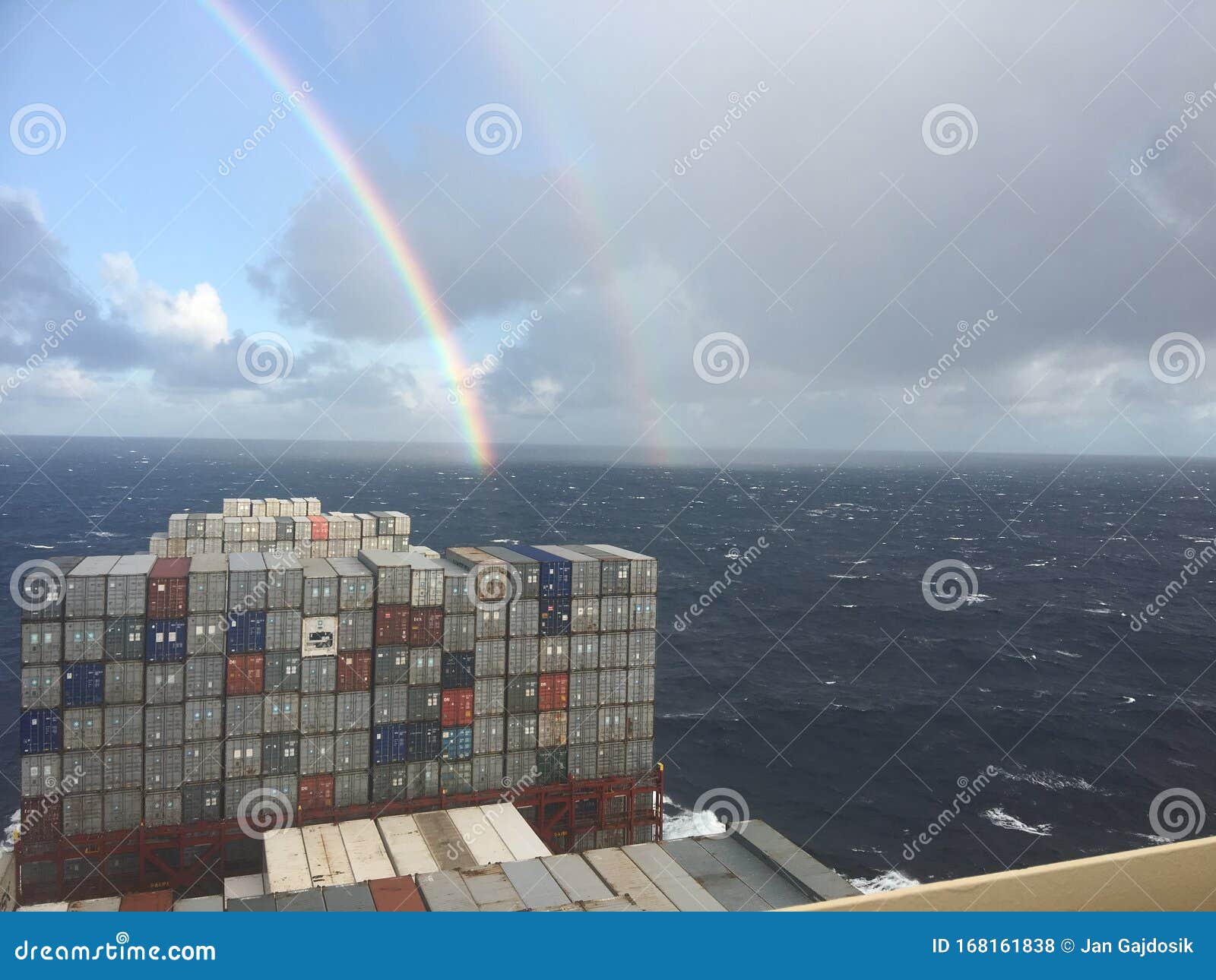 Rainbow in the Ocean from Container Vessel Stock Photo - Image of ocean ...