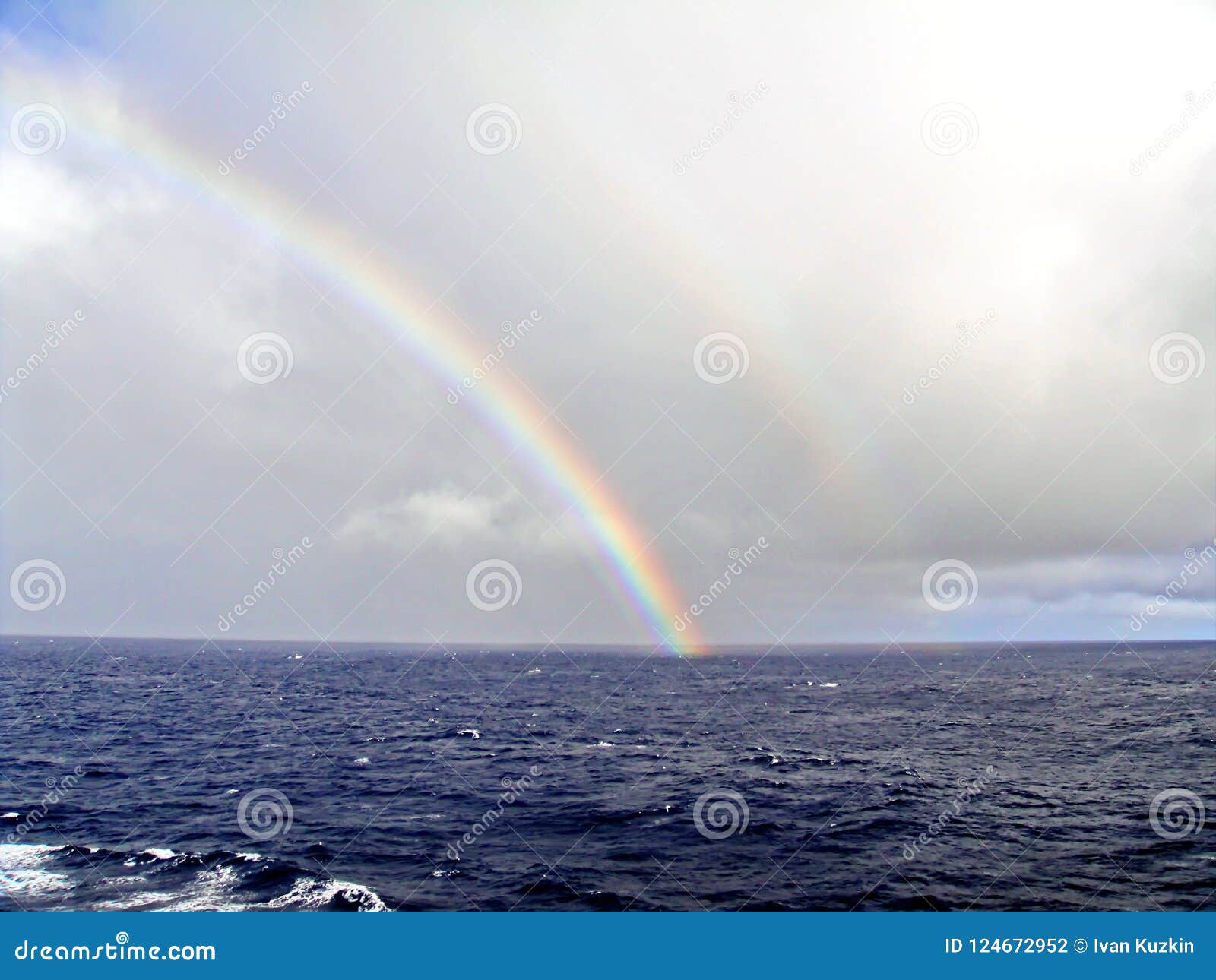 Rainbow in the Ocean after Rain and Thunderstorms. Stock Photo - Image ...