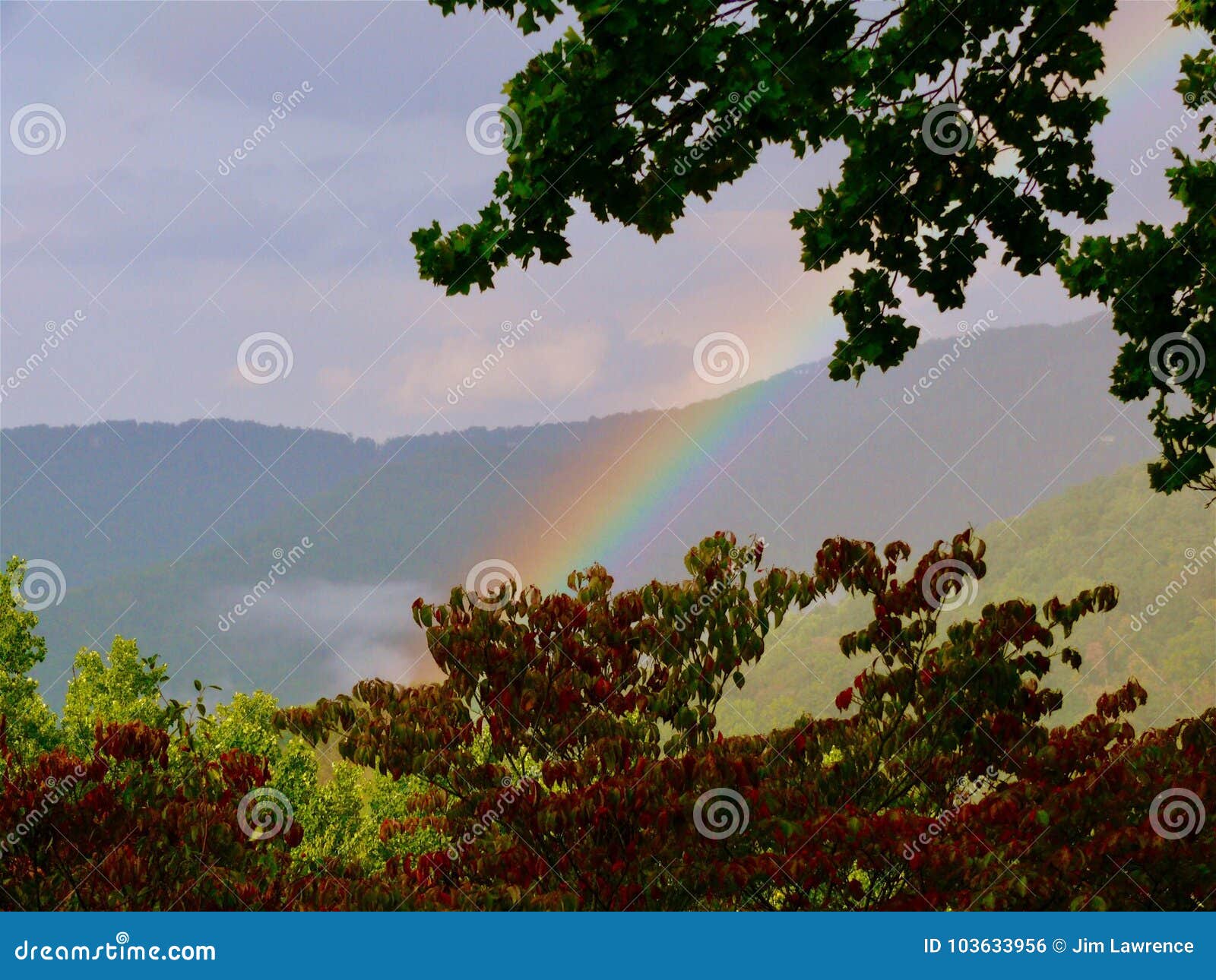 Rainbow in the Mountains stock photo. Image of rainbow - 103633956