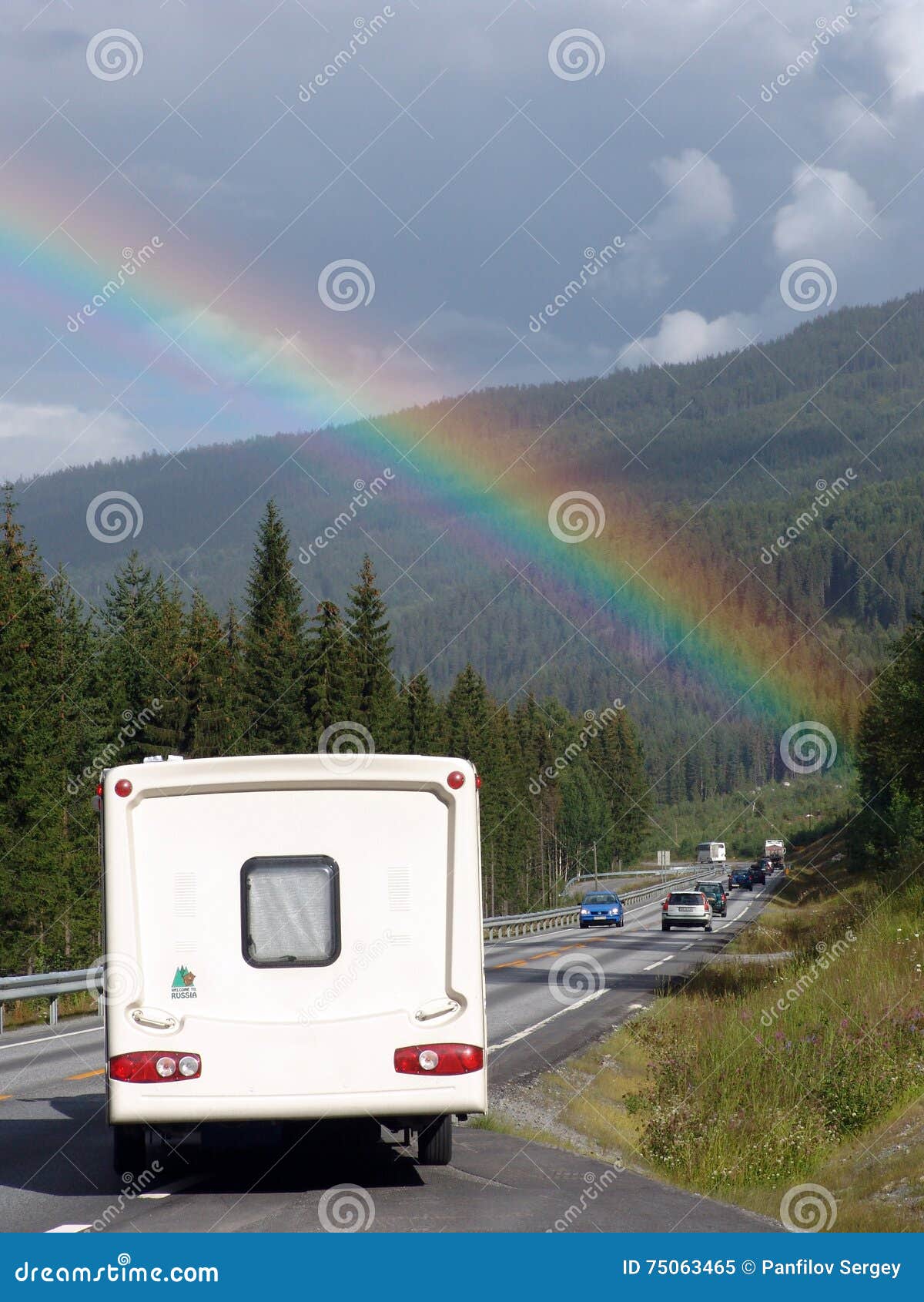 Rainbow over the caravan stock image. Image of forest - 75063465