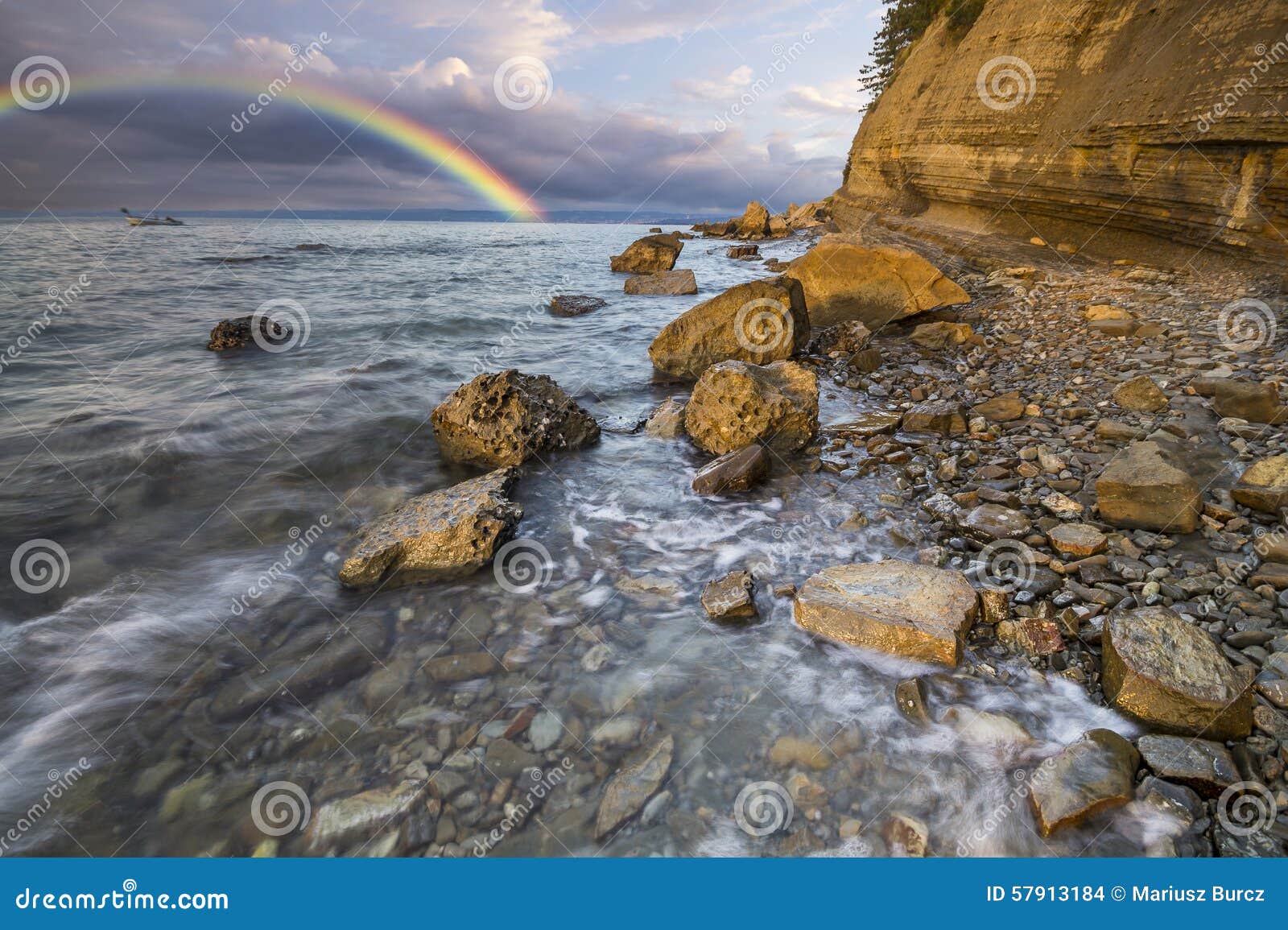 Rainbow Over The Cliff After Passing An Evening Storm Stock Photography ...