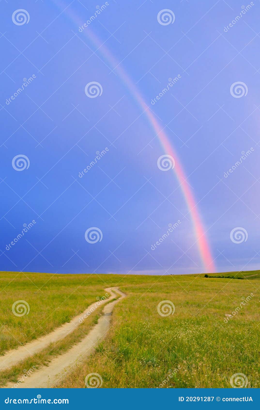 Rainbow over the field stock image. Image of landscape - 20291287