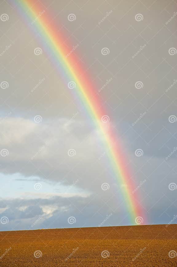 Rainbow Over Freshly Ploughed Land. Stock Image - Image of promise ...