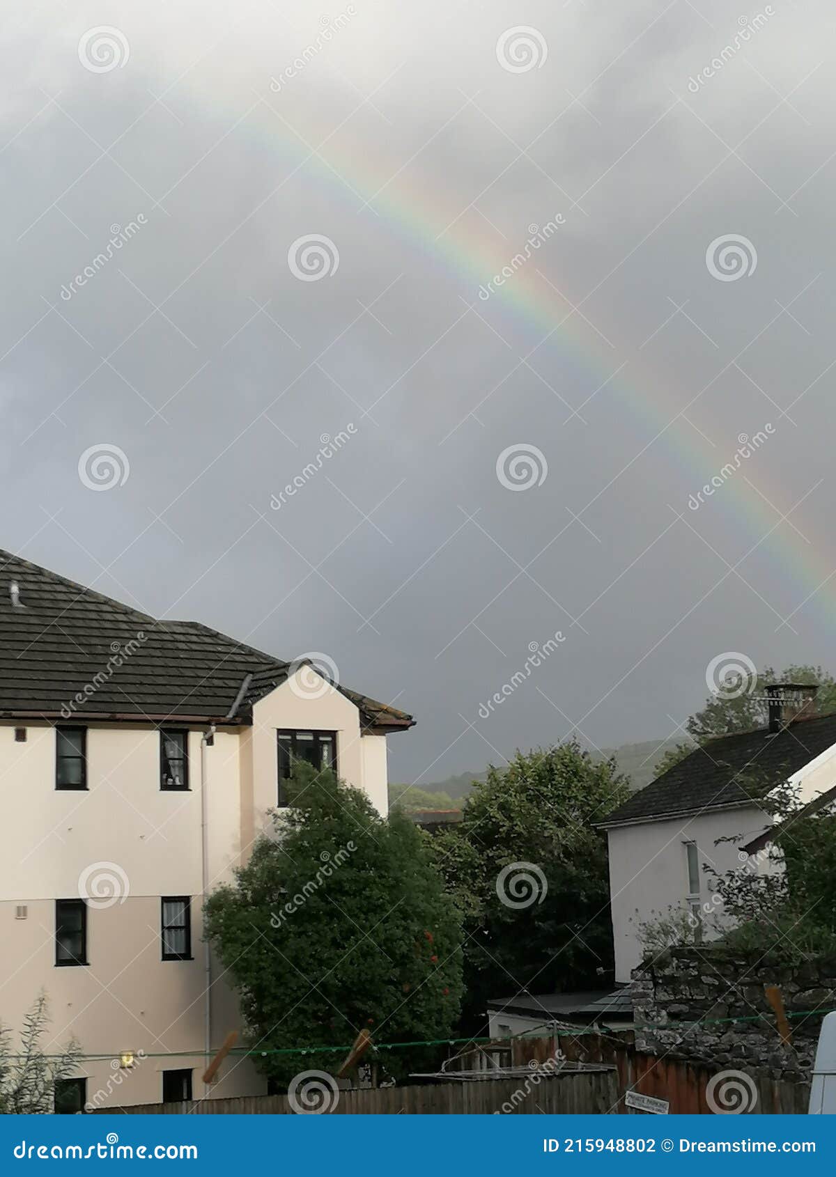 Rainbow over the house stock photo. Image of thunder - 215948802